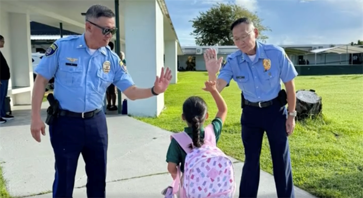 Guam Police Department gives high-fives for a safe school year - KUAM ...